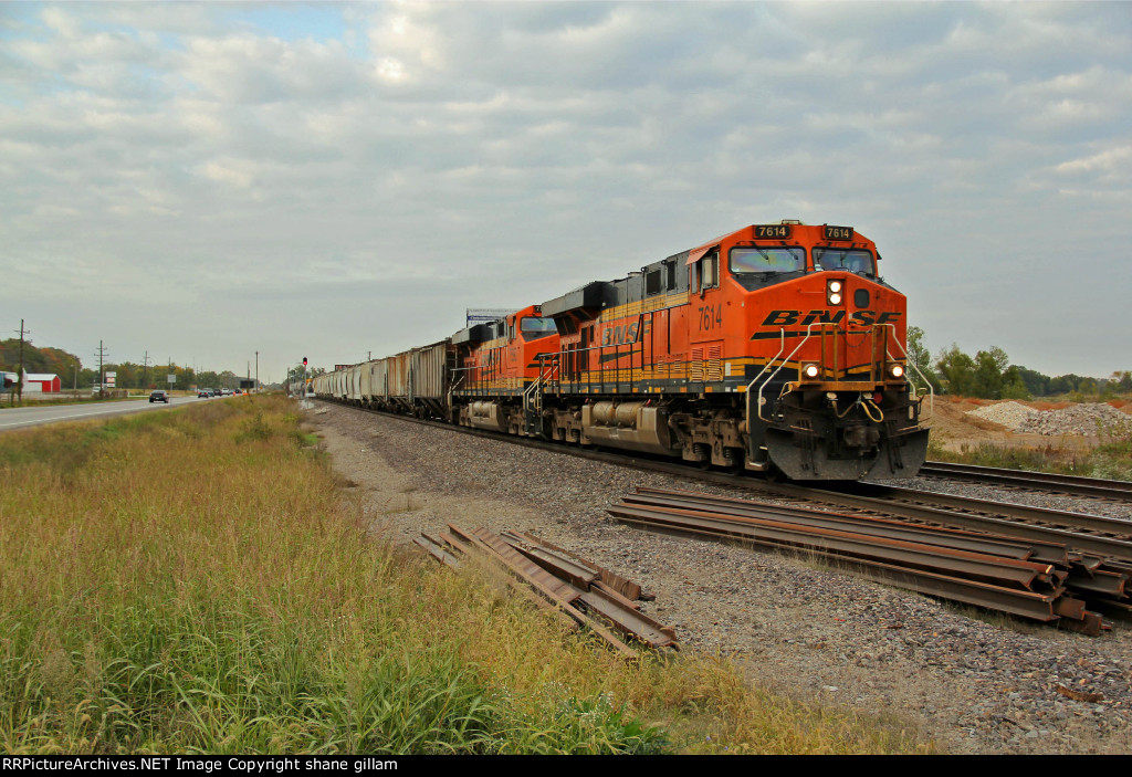 BNSF 7614 rips a Sb freight at old monroe mo.